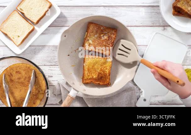 Time lapse. Step by step. Frying french toast in a nonstick frying pan ...