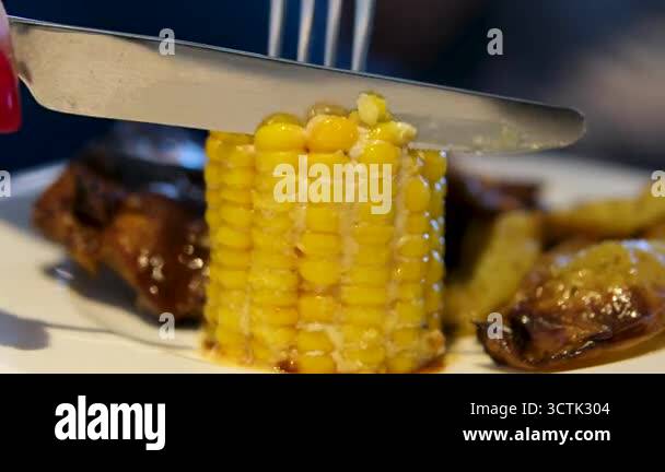 Cutting corn cob Stock Videos & Footage - HD and 4K Video Clips - Alamy