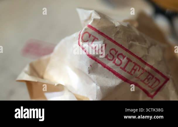 An old sensitive documents and secret information with the stamp ...