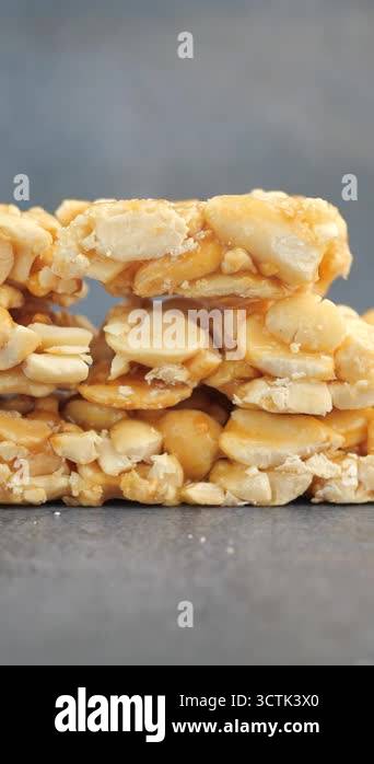 Enjoy making peanut snack bars using nuts and syrup for a tasty treat ...