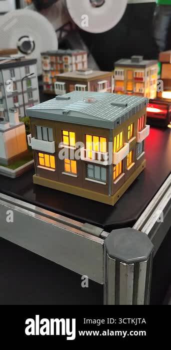 Prototype of building printed on 3D printer from melted plastic. 3D ...