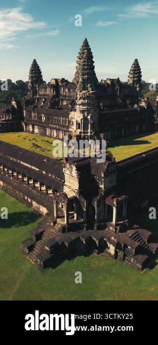 Stunning aerial drone view of Angkor Wat temple complex in Siem Reap, Cambodia. High quality 4K ...