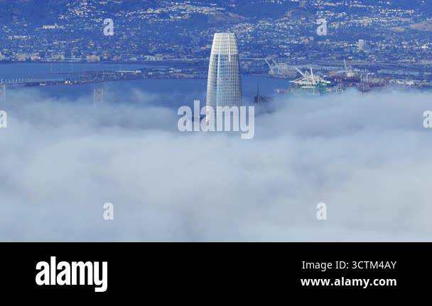 Aerial view of the Golden Gate Bridge as it gradually emerges from ...