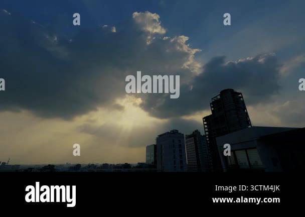 4K Timelapse of Sunlight Breaking Through Clouds from Rooftop in Dhaka - 4K timelapse of the sun ...