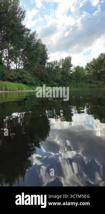 Slow motion video of water in a lake close up. Waves splashing foam in ...
