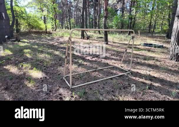 amateur football. football field in the forest. homemade football goals ...