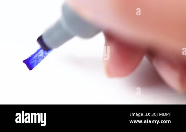 Blue marker lines drawn on paper representing highlight, emphasis, or ...