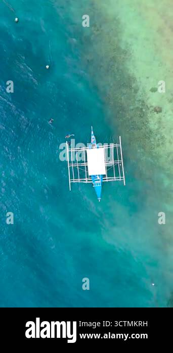 Man in an outrigger boat Stock Videos & Footage - HD and 4K Video Clips ...
