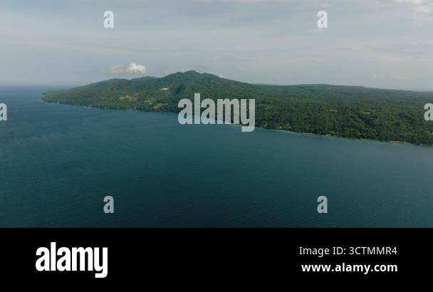Aerial view of tropical island and blue sea. Blue sky and clouds. Samal ...