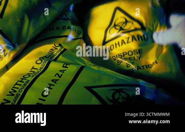 Medical Waste Packet Put Down In Pile Stock Video Footage - Alamy