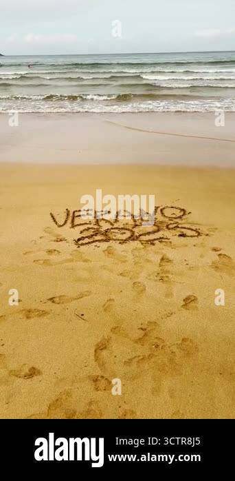 Rodiles Beach in Villaviciosa, Spain, under cloudy weather with soft ...