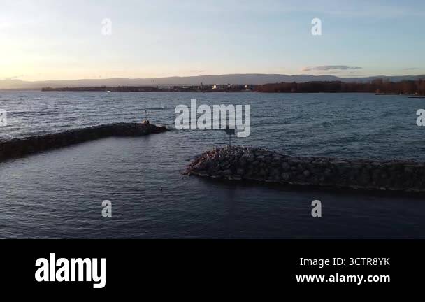 Aerial view of sturdy piers and wave breakers at Lausanne, protecting ...