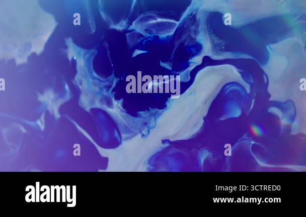 Fluorescent liquid. Blur dye swirl. Blue white purple paint spill on ...