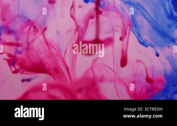 Pigment fume. Paint blob water. Color dripping mix flow defocused fluid ...