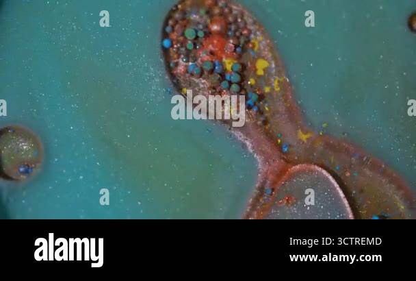 Glitter paint. Oil background. Defocused blue orange yellow color ...