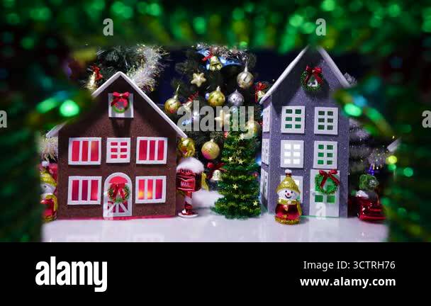 The Christmas wreath features a Christmas village with snowmen and ...