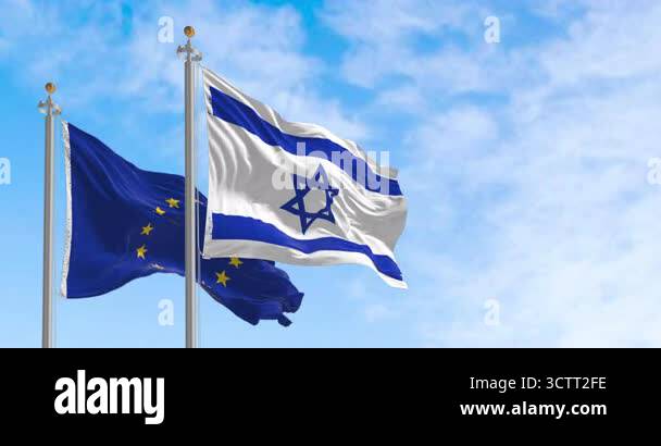 Israel national flag waving in the wind with the European Union flag ...