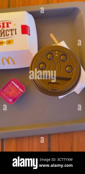 McDonalds Big Mag, Big Tasty, French fries, coffee, woman eating in a ...