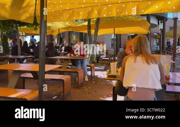 McDonalds Big Mag, Big Tasty, French fries, coffee, woman eating in a ...