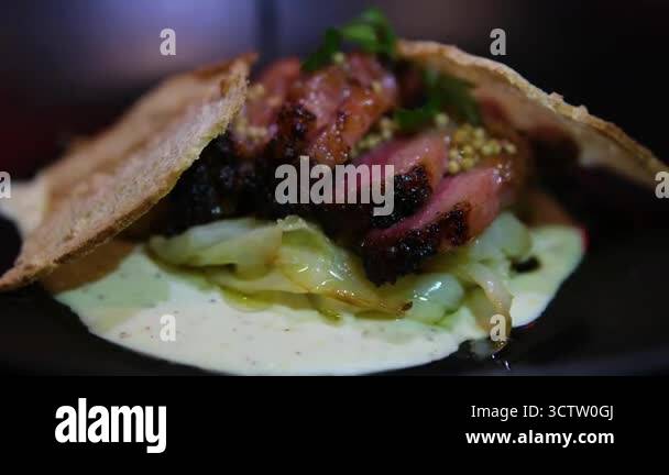 Creative meat dish plating showcasing elegant presentation for gourmet ...