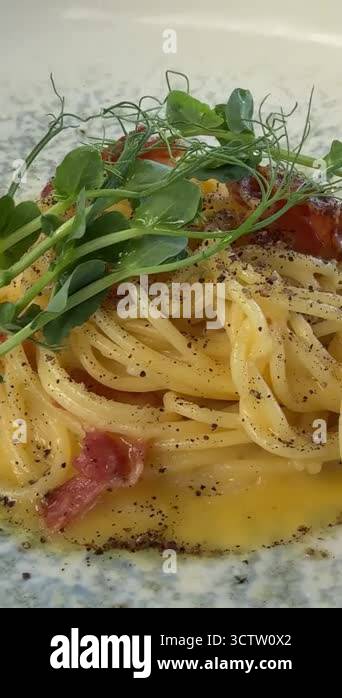 Authentic Italian carbonara pasta without cream with golden crispy ...