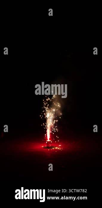 Box fireworks streamed gold and white sparks, a traditional way to ...