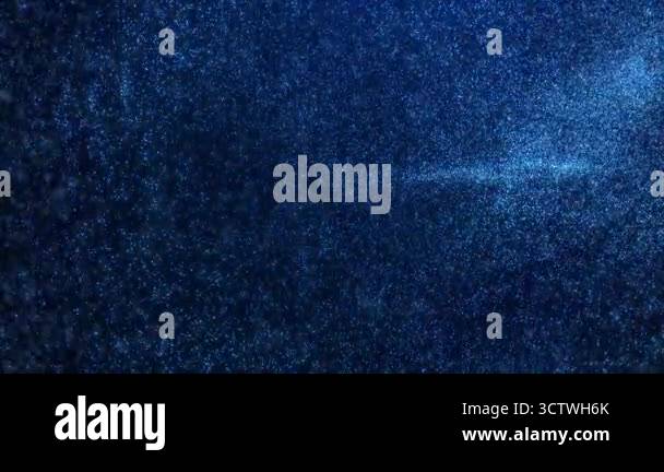 Abstract blue magical particle background, glowing particles glow and ...