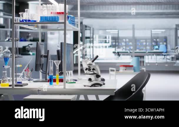Empty laboratory workspace displays jars and blood samples or tools ...