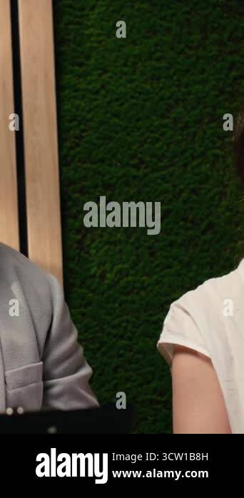 Vertical Video Job seekers sitting in the waiting area outside the HR ...