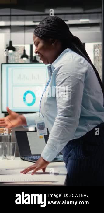 Vertical Video Female recruiter conducting interview with african ...