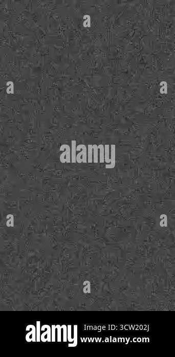 Vertical video of realistic TV static and VHS noise. Monochrome ...