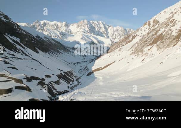 Aerial panorama of Shkhara mountain peak in winter, the highest summit ...