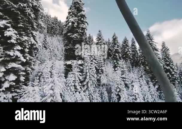 Point of view sitting on ski lift chair solo ride going up to ski pov ...