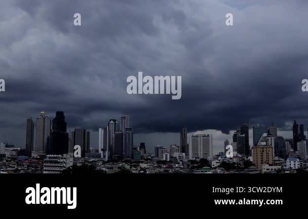 Time-lapse Fast-moving rain clouds sweep over Bangkok in a dramatic ...