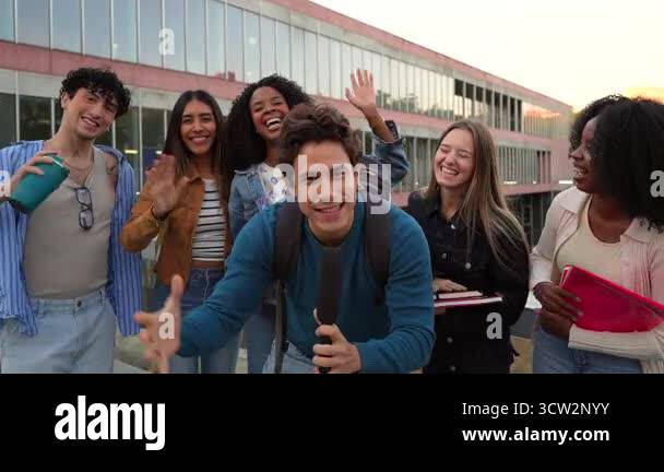 Energetic student journalist reporting with a microphone while a ...