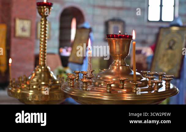 Candlestick with burning candles in an Orthodox church Stock Video ...