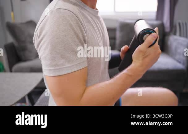 Person Applying Massage Gun on Arm Muscle with Side Angle, Pain Relief ...