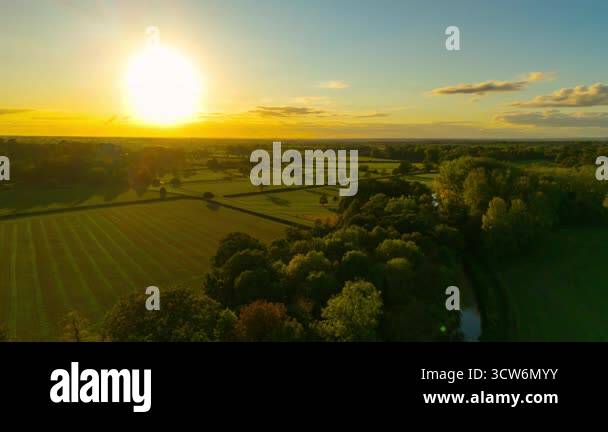 Timelapse sunset moving clouds and shadows, harmony of greenery and ...