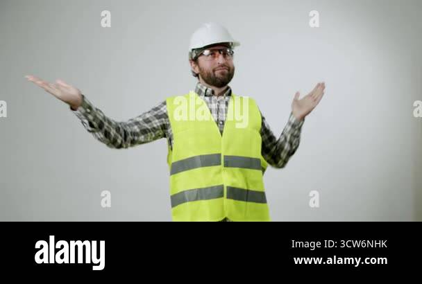 Confused construction worker or foreman shrugging shoulders. He does ...