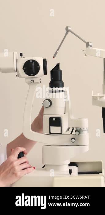 Doctor using professional ophthalmic equipment Stock Videos & Footage ...
