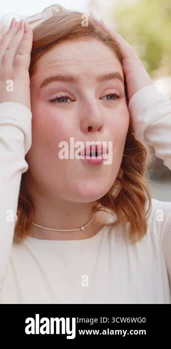 Oh my God, Wow. Amazed young woman looking surprised at camera with big ...