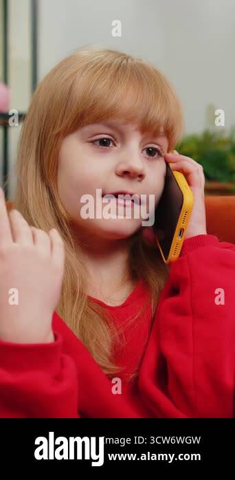 Phone call, good news, gossip. Happy surprised preteen child girl in ...