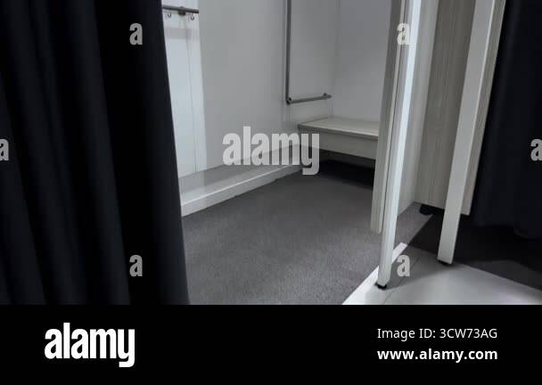 Empty changing room designed for people with disabilities features ...