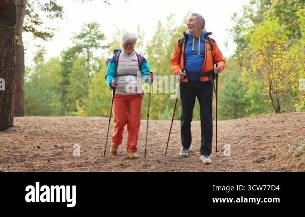 Hiking tourism adventure. Senior couple man woman enjoying outdoor ...
