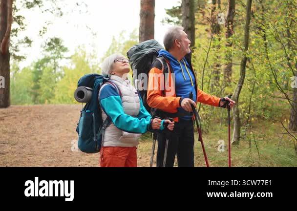 Hiking tourism adventure. Senior couple man woman enjoying outdoor ...