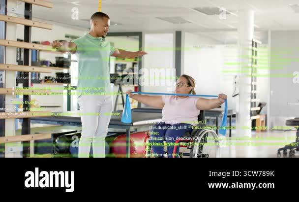 Therapist cueing patient in wheelchair pulling band in therapy, with ...