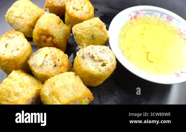 Deep fried chicken meat rolls in plate, in door Chiangmai Thailand ...