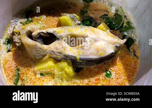 Cooking fish curry with pumpkin, Thai traditional food Stock Video ...