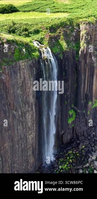Discover the stunning waterfall cascading down rugged cliffs on the ...