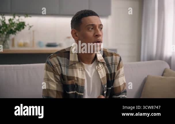 Upset worried uncomfortable African American man male guy suffering ...